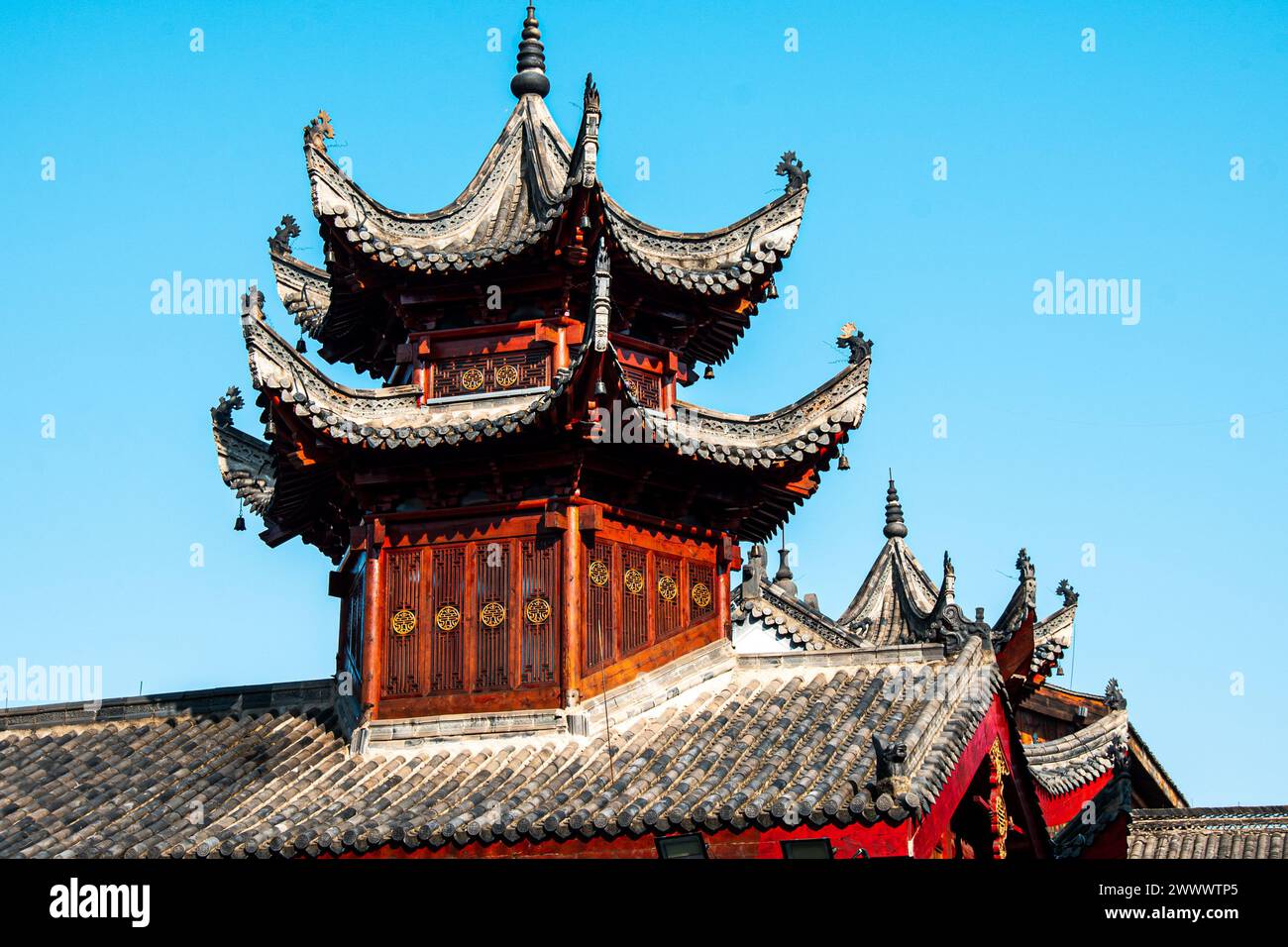 The traditional Chinese brick and wood architecture under sunlight in ...