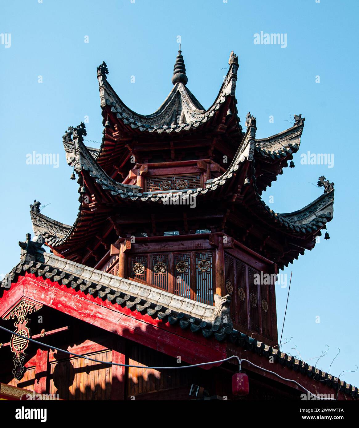 The traditional Chinese brick and wood architecture under sunlight in ...