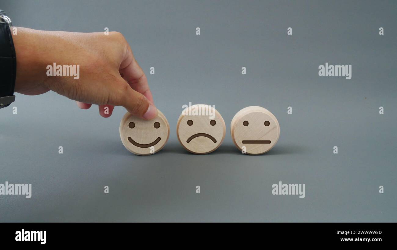 Hand holding wood happy smile face. Concept of mental health, medical ...