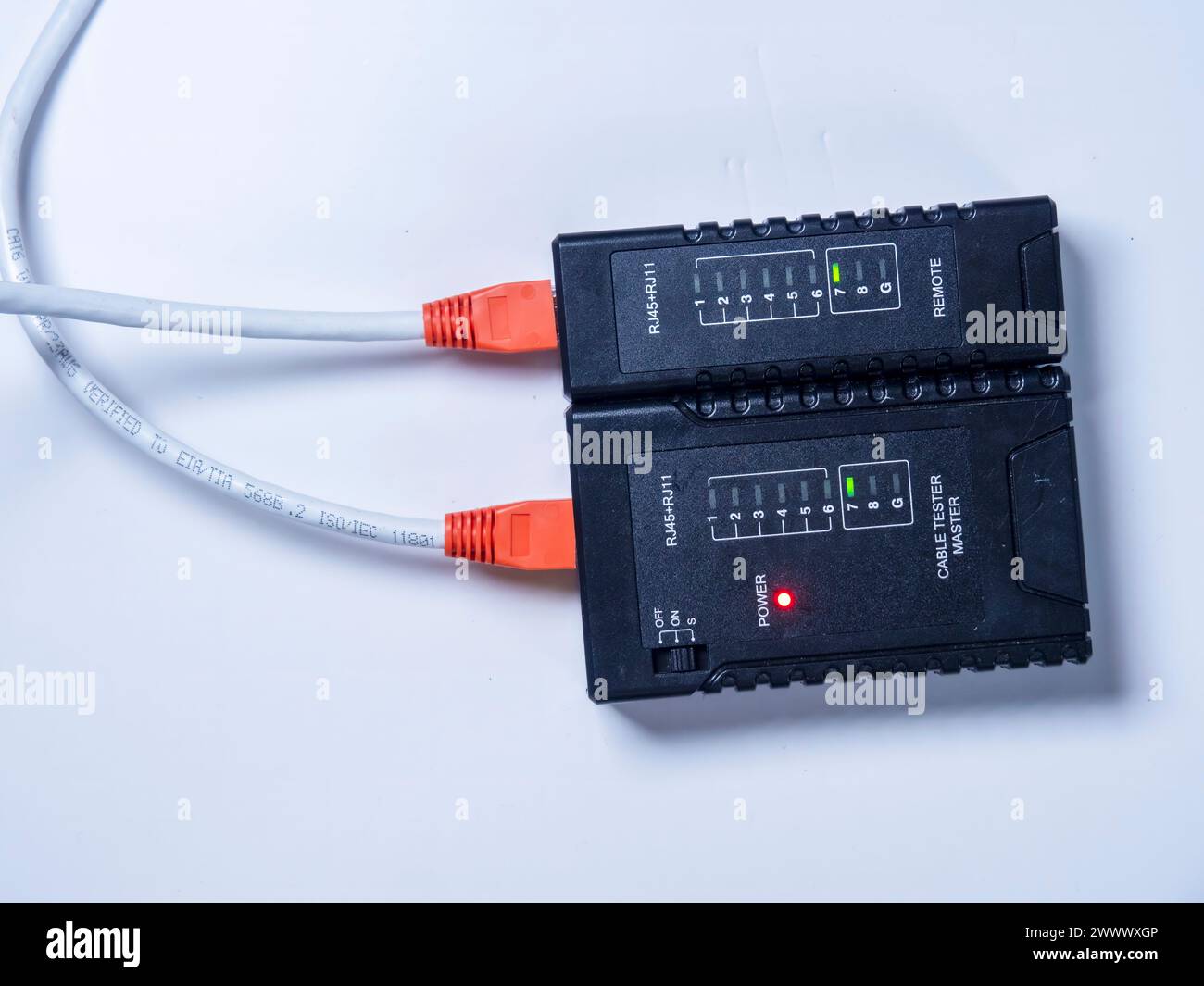 Testing a network cable with RJ45 connectors Stock Photo - Alamy