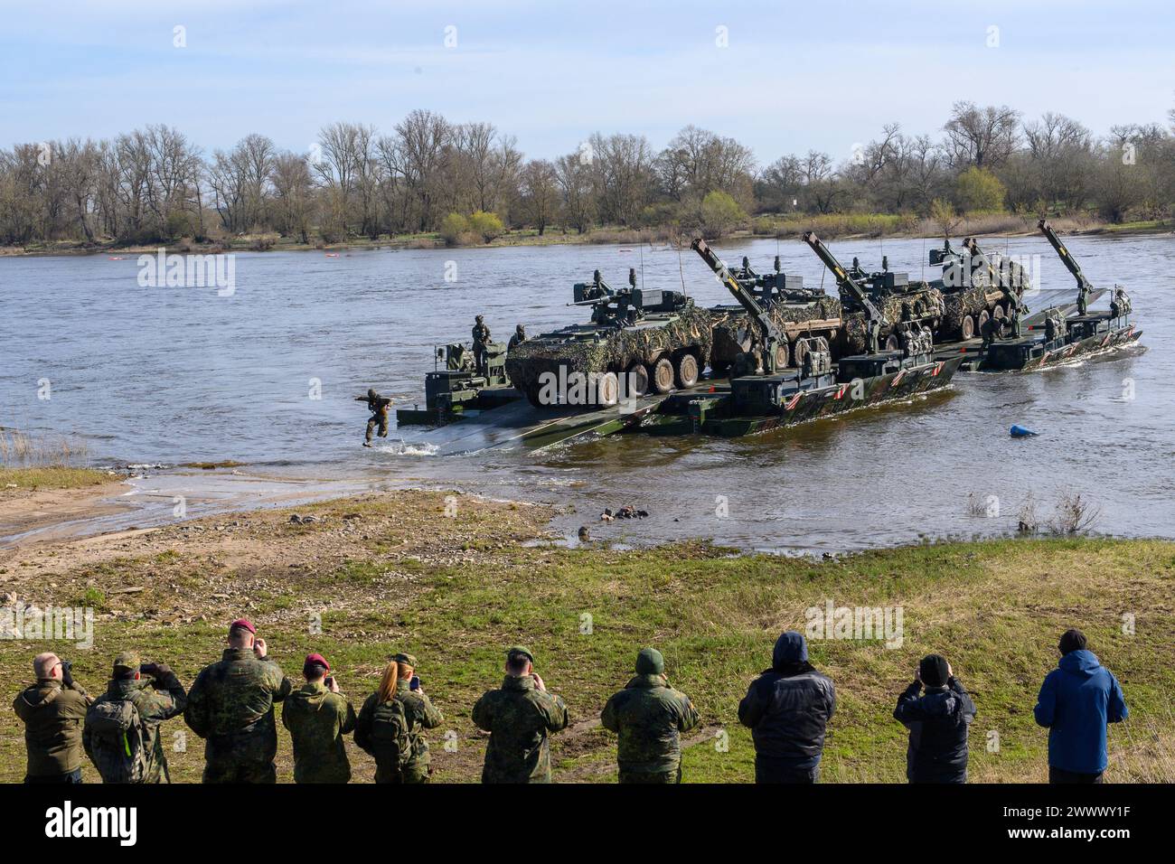 Storkau, Germany. 26th Mar, 2024. An M3 amphibious floating bridge from ...