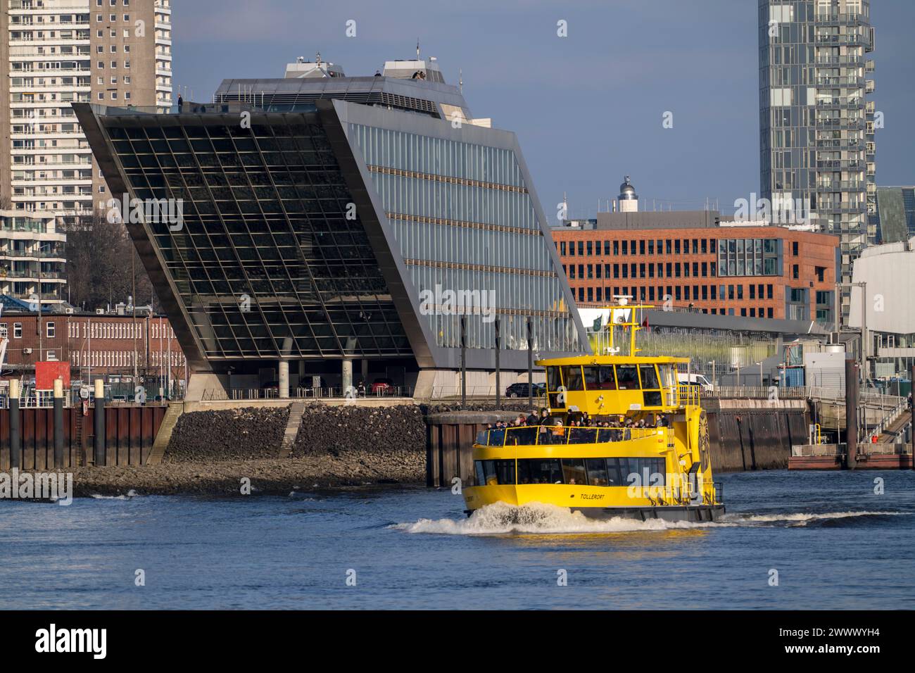 Hadag harbor ferry on the Elbe, Docklands building at the fishing port ...