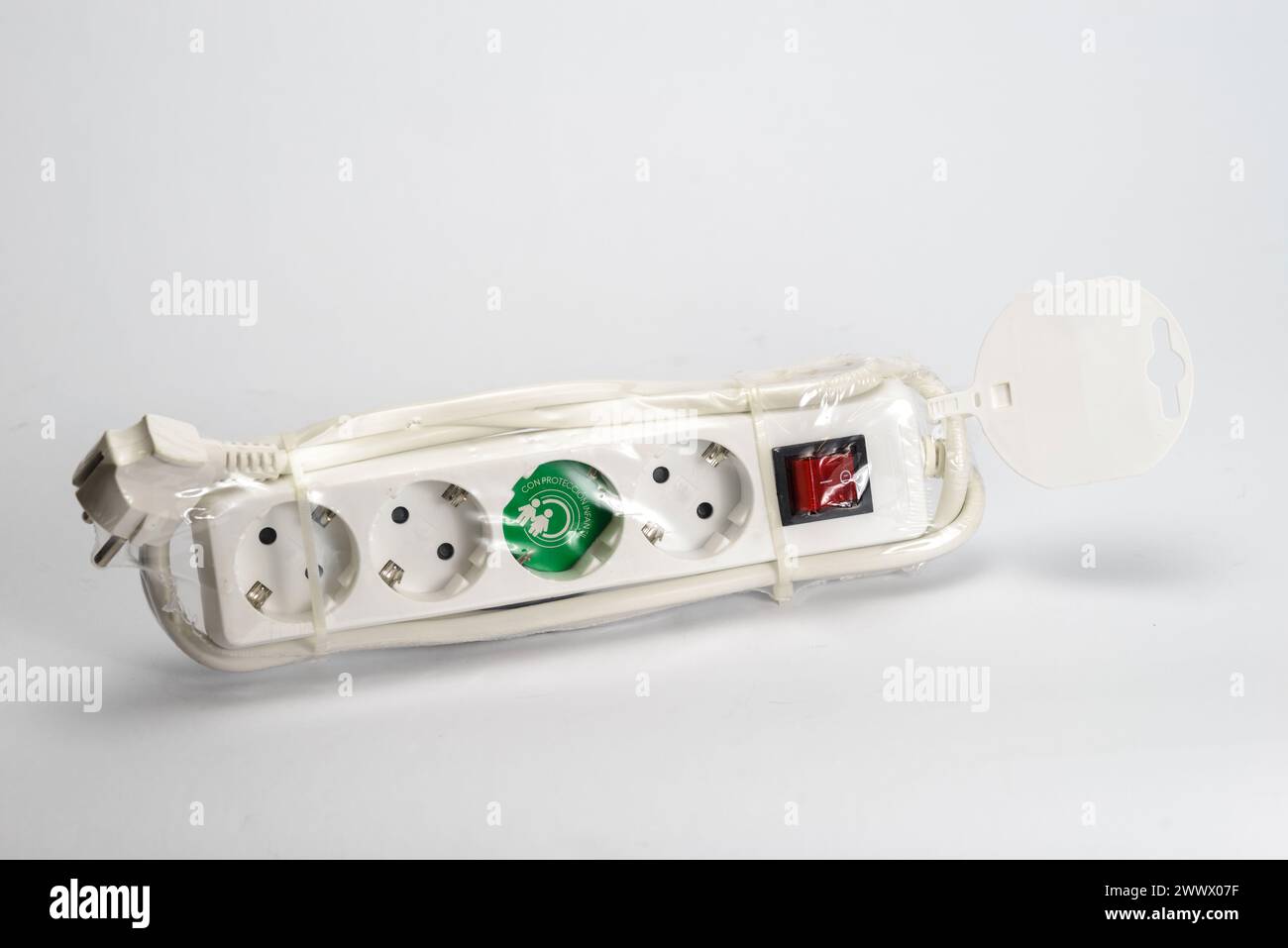Electrical cable extension with four European type plugs on white ...