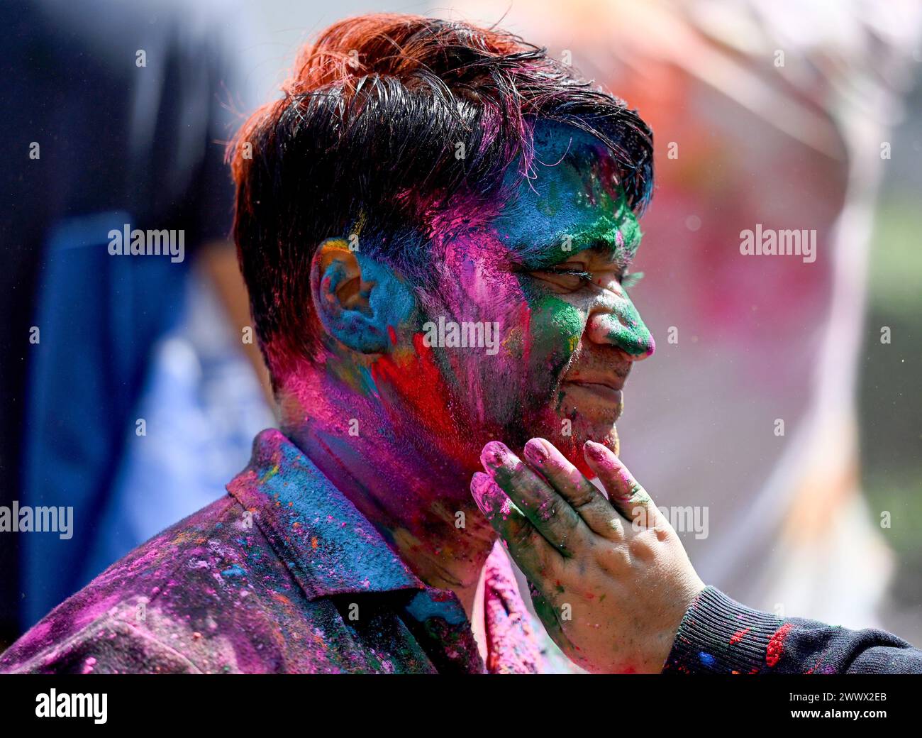 NOIDA, INDIA - MARCH 25: People celebrate Holi at Sector 121, on March ...