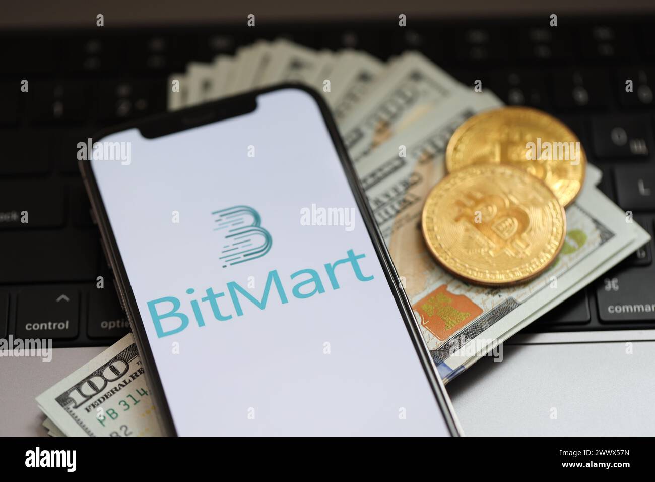 KYIV, UKRAINE - MARCH 15, 2024 Bitmart logo on iPhone display screen ...