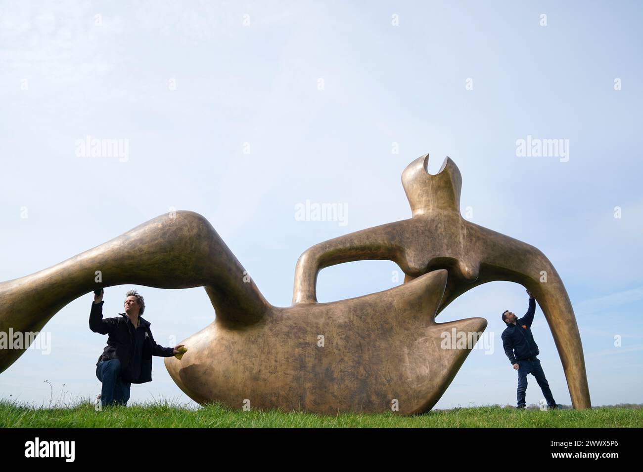 Art technicians Matthias Kessemeier and Dai Roberts clean the bronze ...