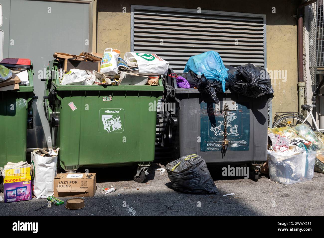 Overfilled Waste Collection Bins Stock Photo - Alamy