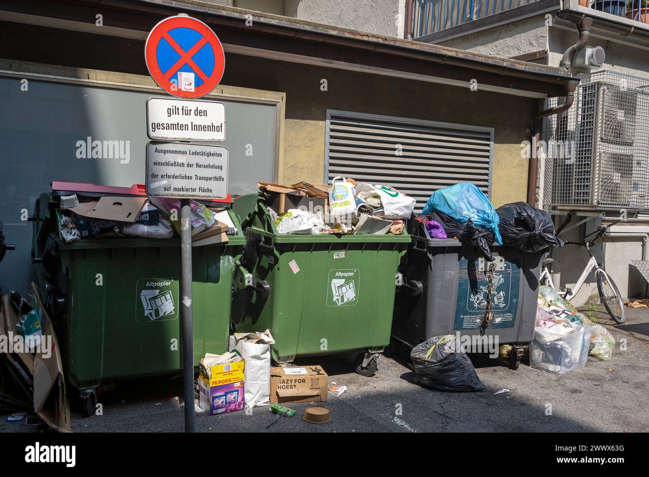 Overfilled Waste Collection Bins Stock Photo - Alamy