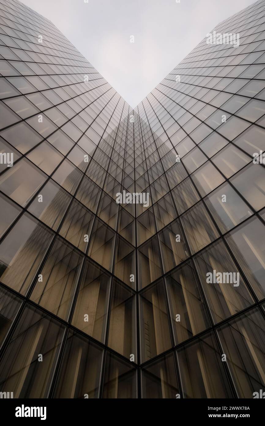 A low-angle view of modern glass buildings Stock Photo - Alamy