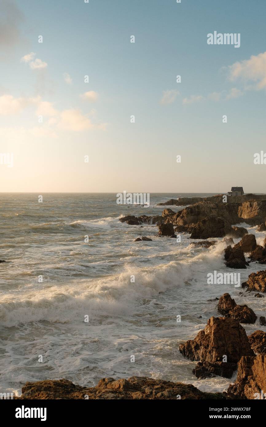 The ocean waves hitting cliffs along the coast Stock Photo - Alamy
