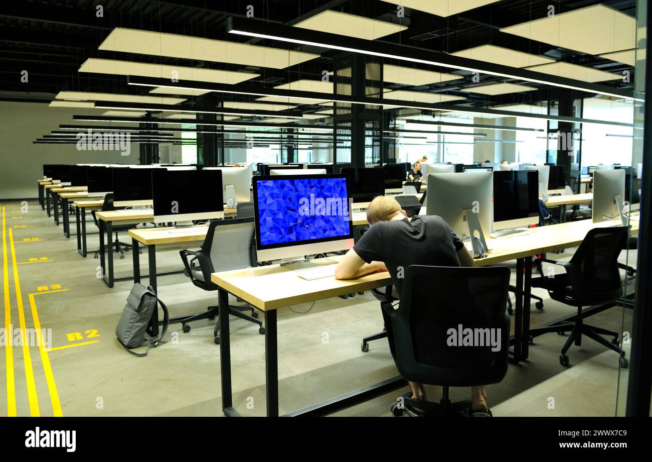 People sitting computers working office hi-res stock photography and ...