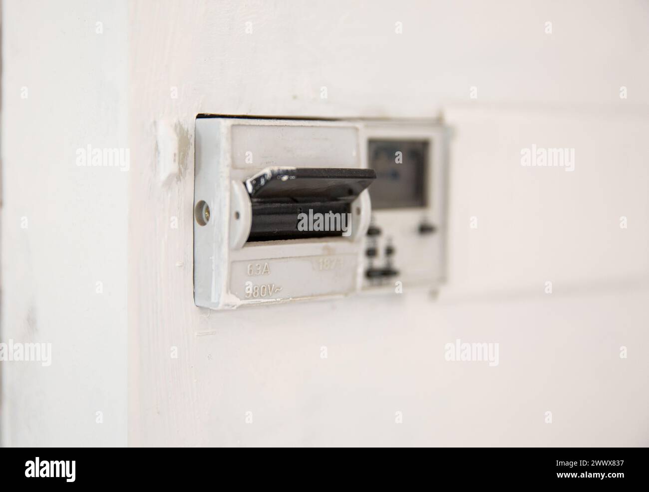 Close up of an old electric power meter on wall Stock Photo - Alamy
