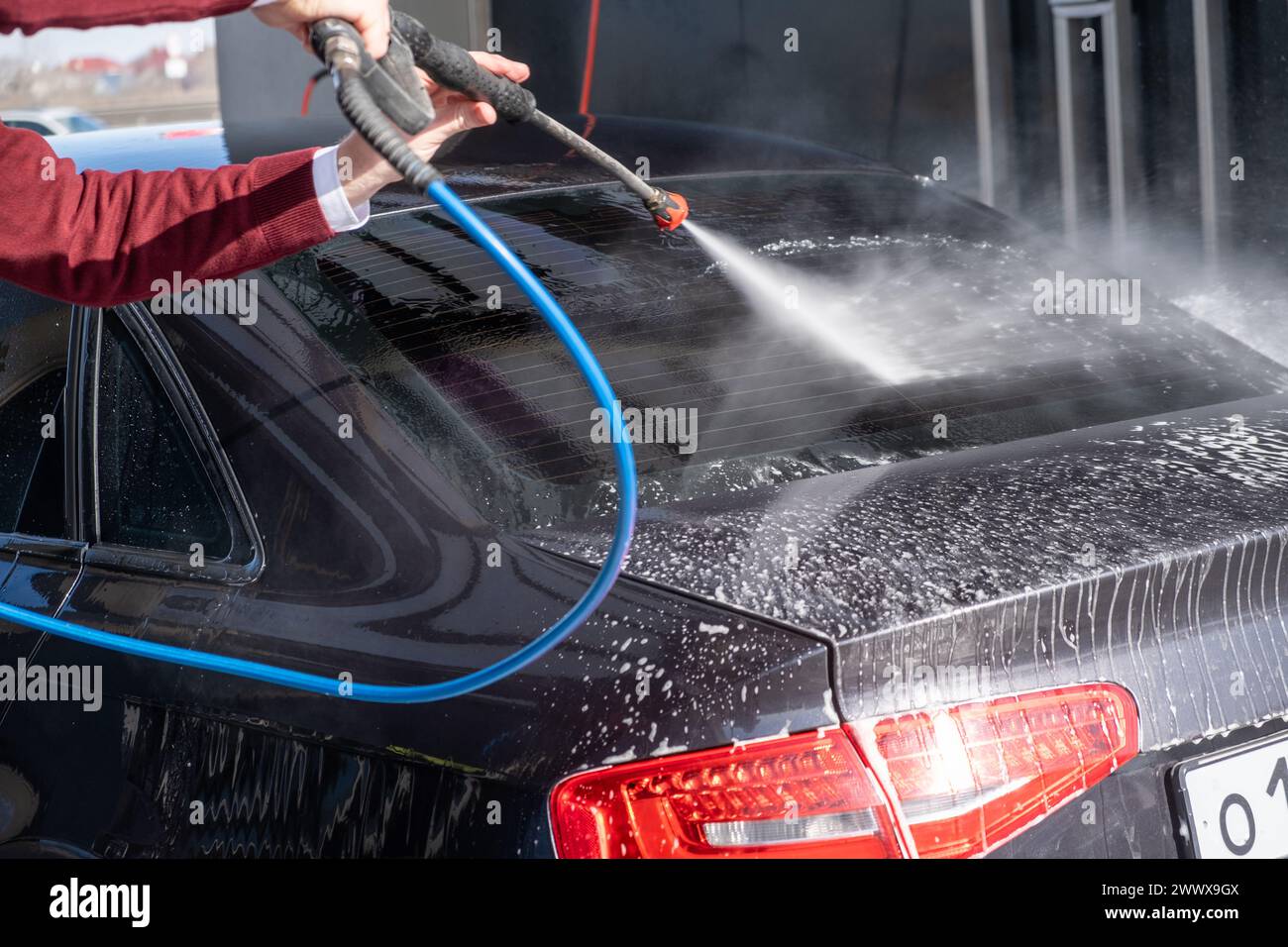 Man washing car off cleaning hi-res stock photography and images - Alamy