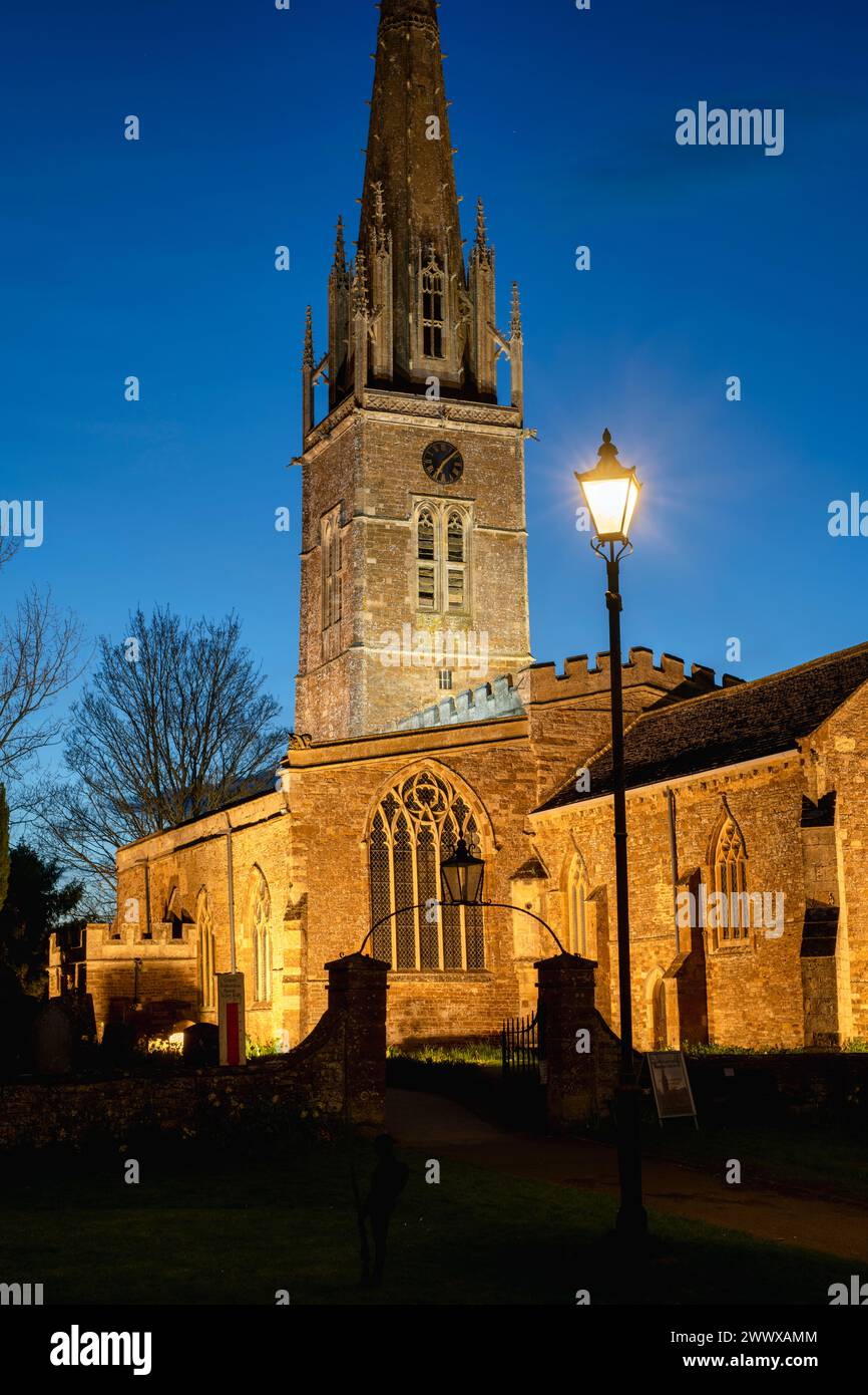 St Peter and St Paul's Church in Kings Sutton at dusk. Kings Sutton ...