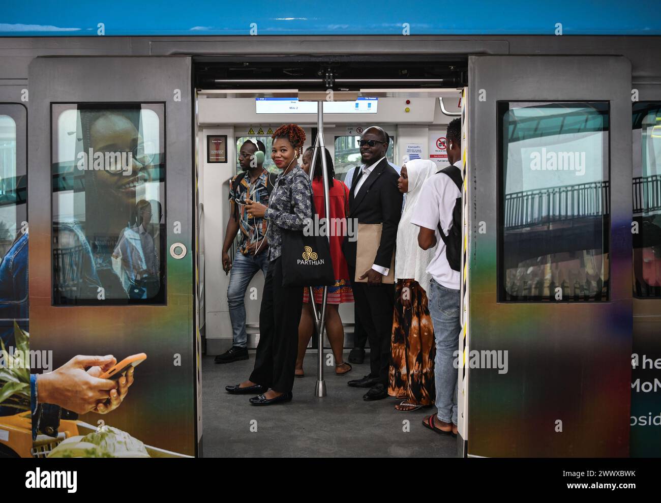 (240326) -- LAGOS, March 26, 2024 (Xinhua) -- People take a train of the Lagos Rail Mass Transit ...