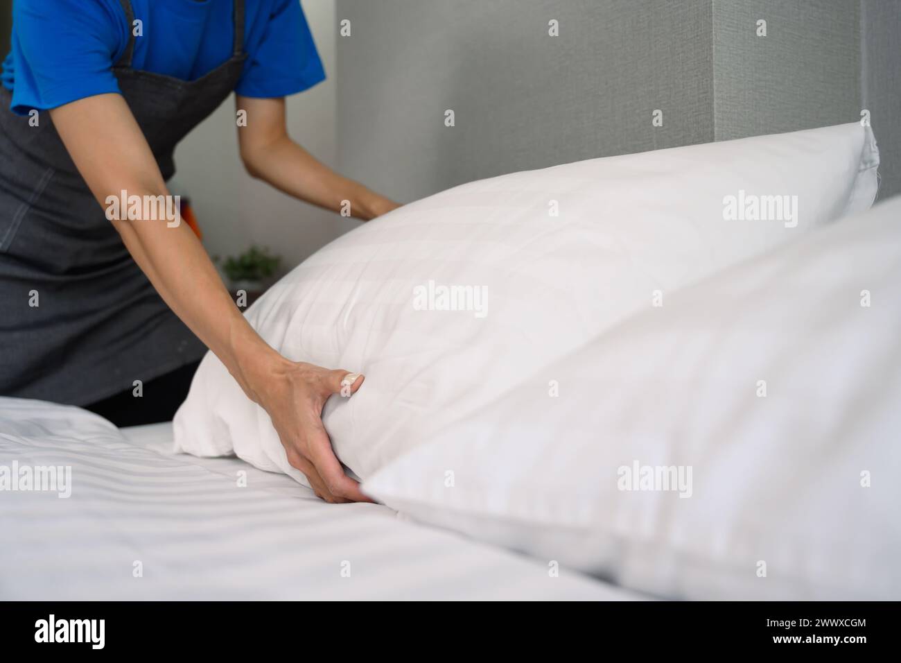 Household housewife making bed hi-res stock photography and images - Alamy