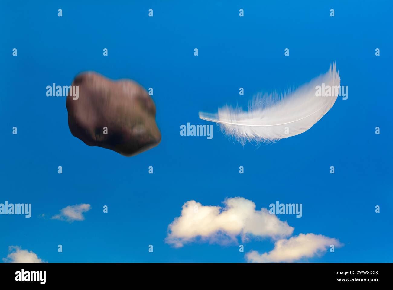 Feather falling hi-res stock photography and images - Alamy