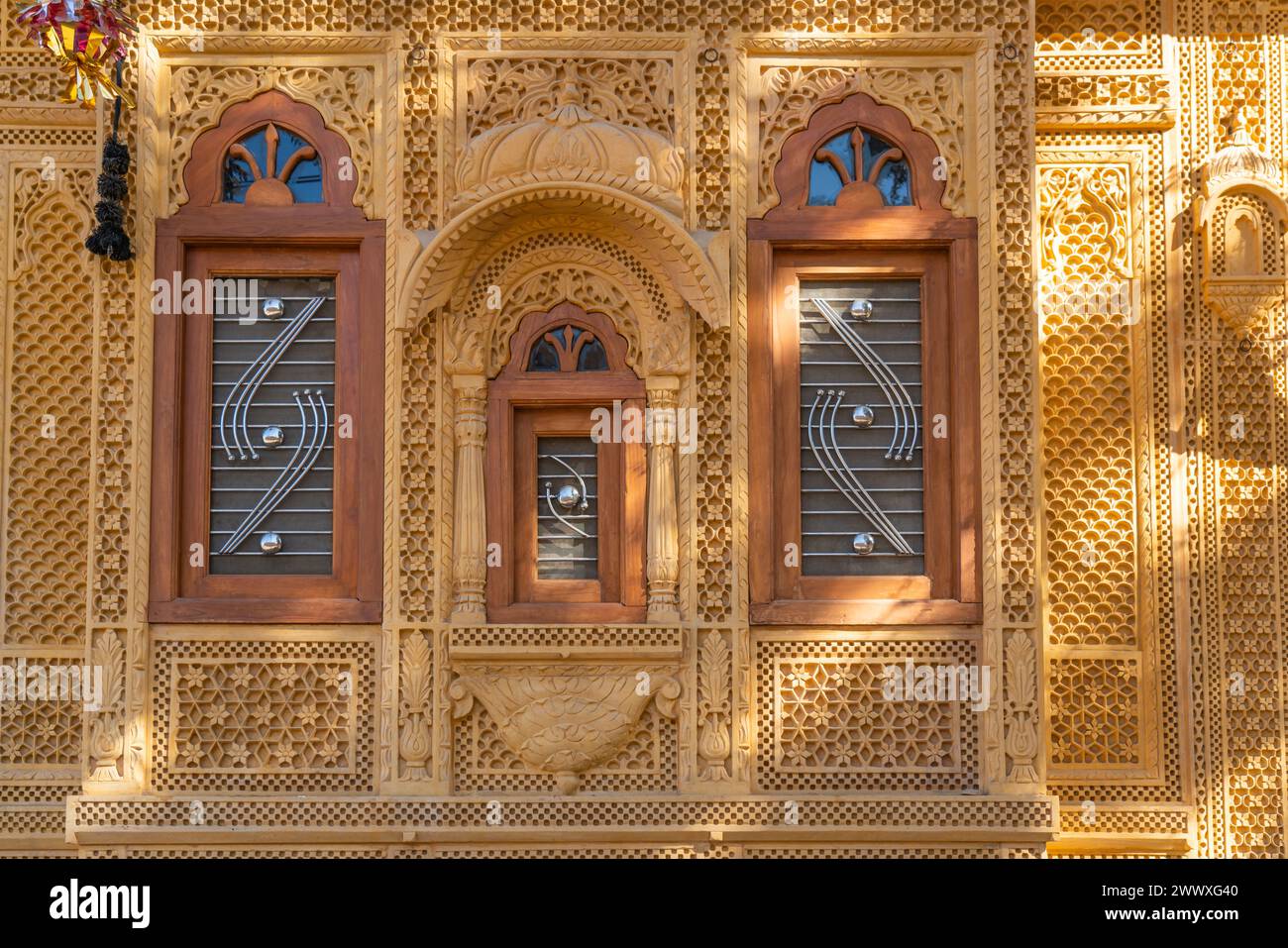 Windows from the yellow gold sandstone buildings in Jaisalmer, the ...