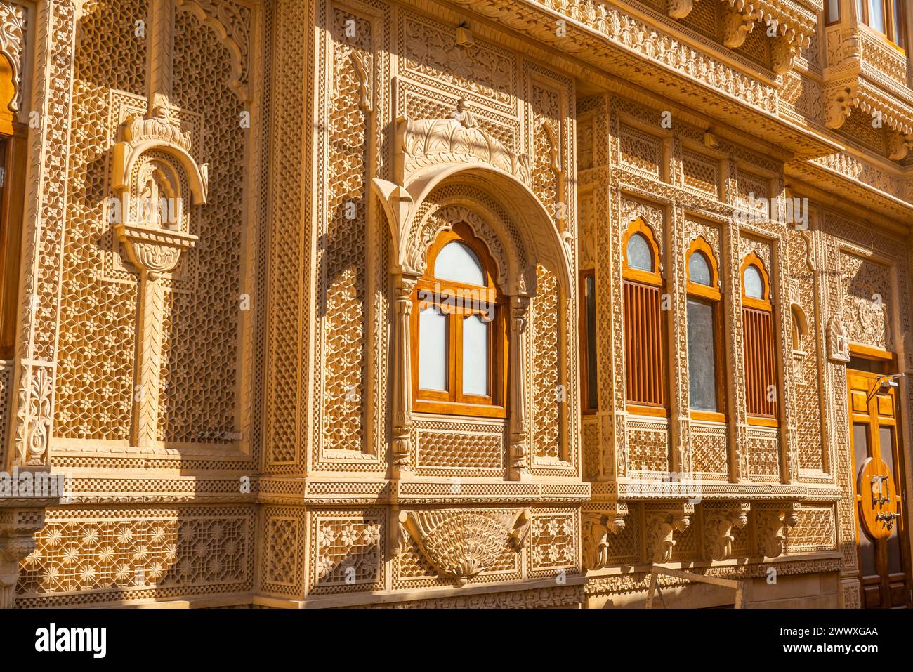 Windows from the yellow gold sandstone buildings in Jaisalmer, the ...