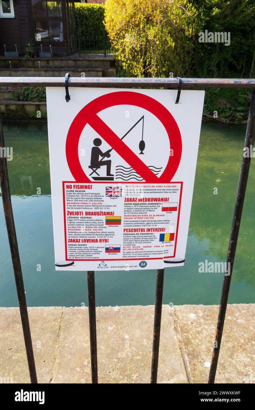No fishing warning sign on a railing in multi lingual Eastern European ...
