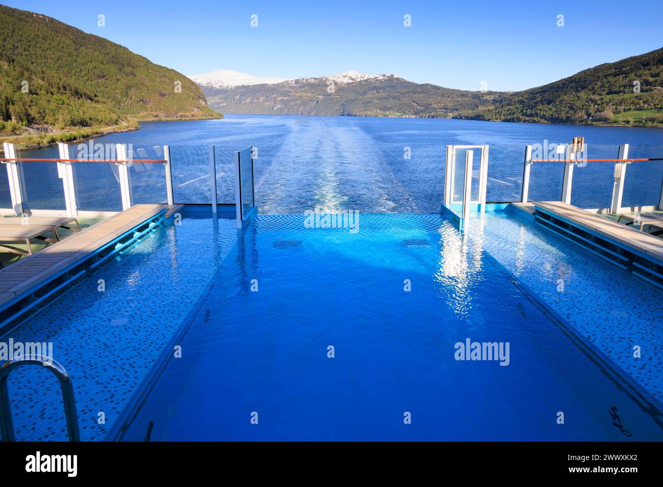 Infinity pool at the back of fjord cruise ship, MS Iona. Olden, Norway ...