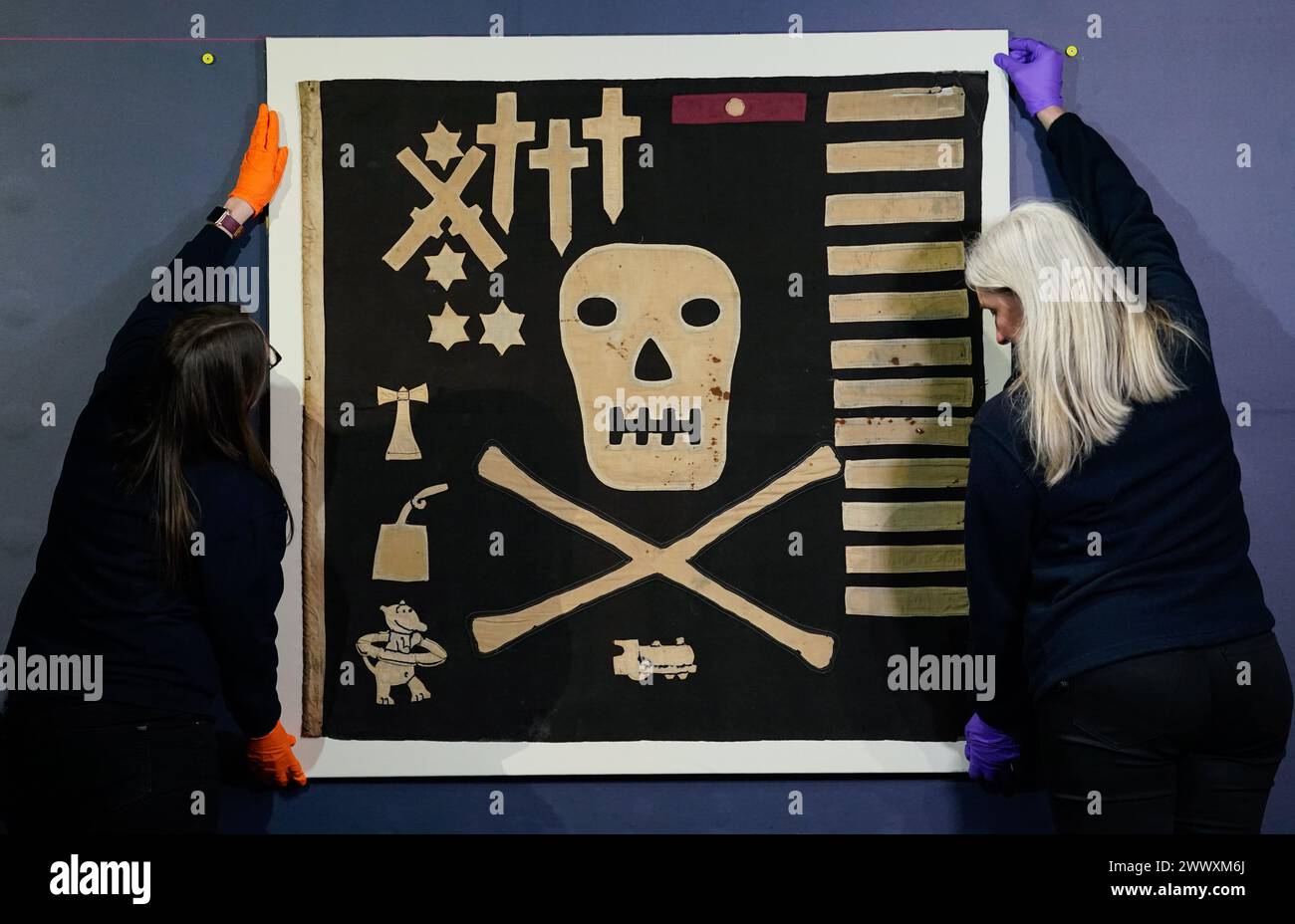 A Jolly Roger from HMS Unruffled, flown during the Second World War, is ...