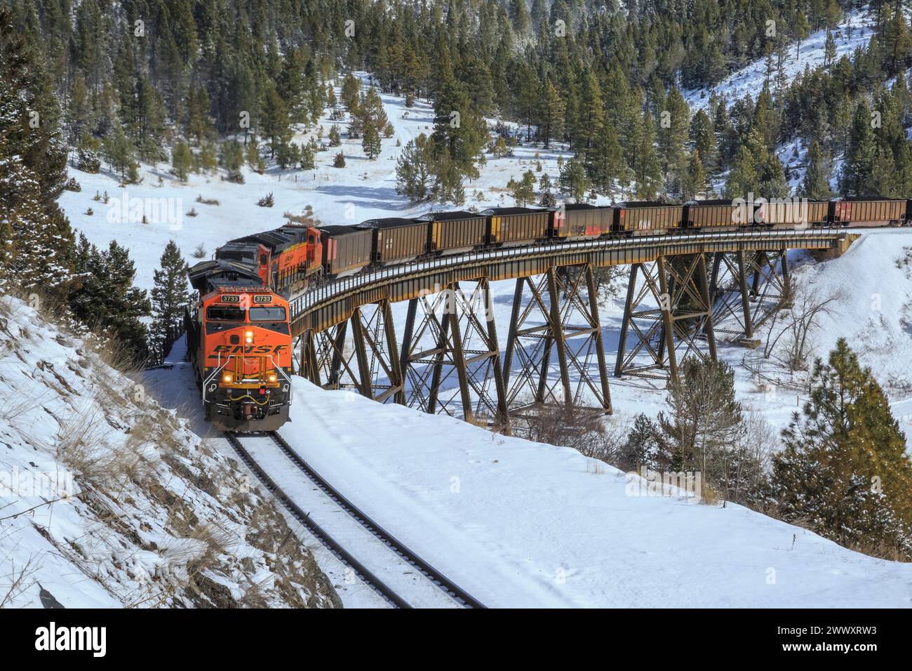 coal train on a trestle heading towards mullan pass on the continental ...