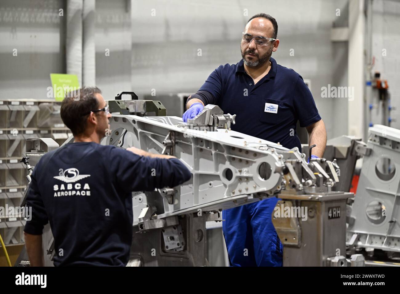 Brussels, Belgium. 26th Mar, 2024. Workers pictured in action at a ...