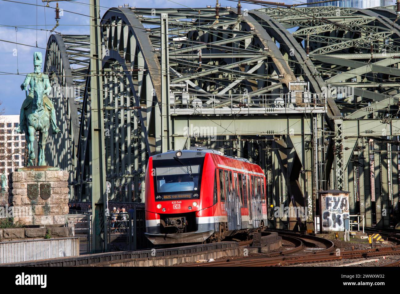 Deutsche Bahn local train coming from Hohenzollern bridge in the ...