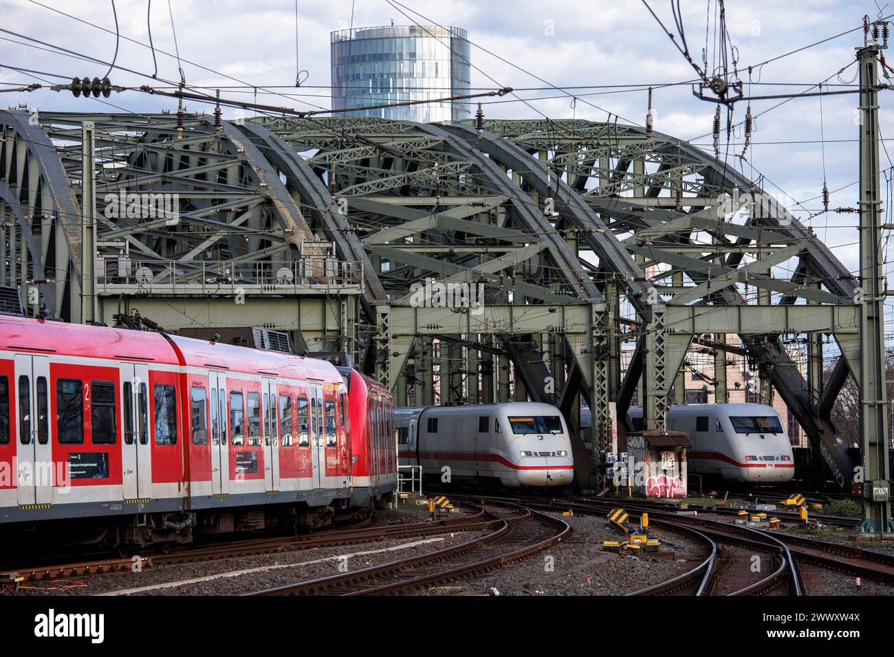 local train and ICE trains on Hohenzollern bridge, Cologne, Germany ...