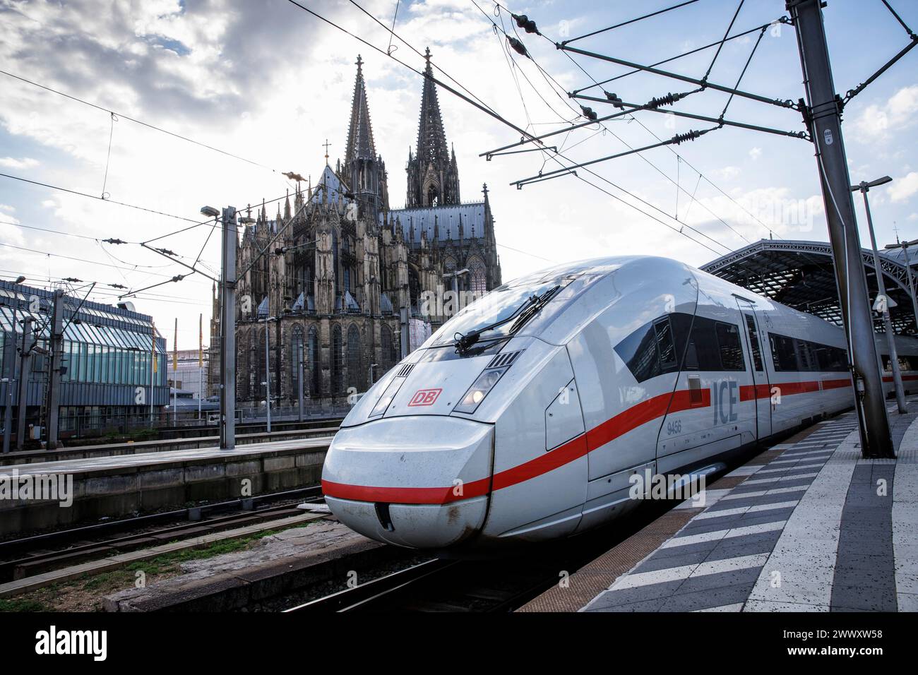 high-speed train ICE 4 leaving the central station, the cathedral ...