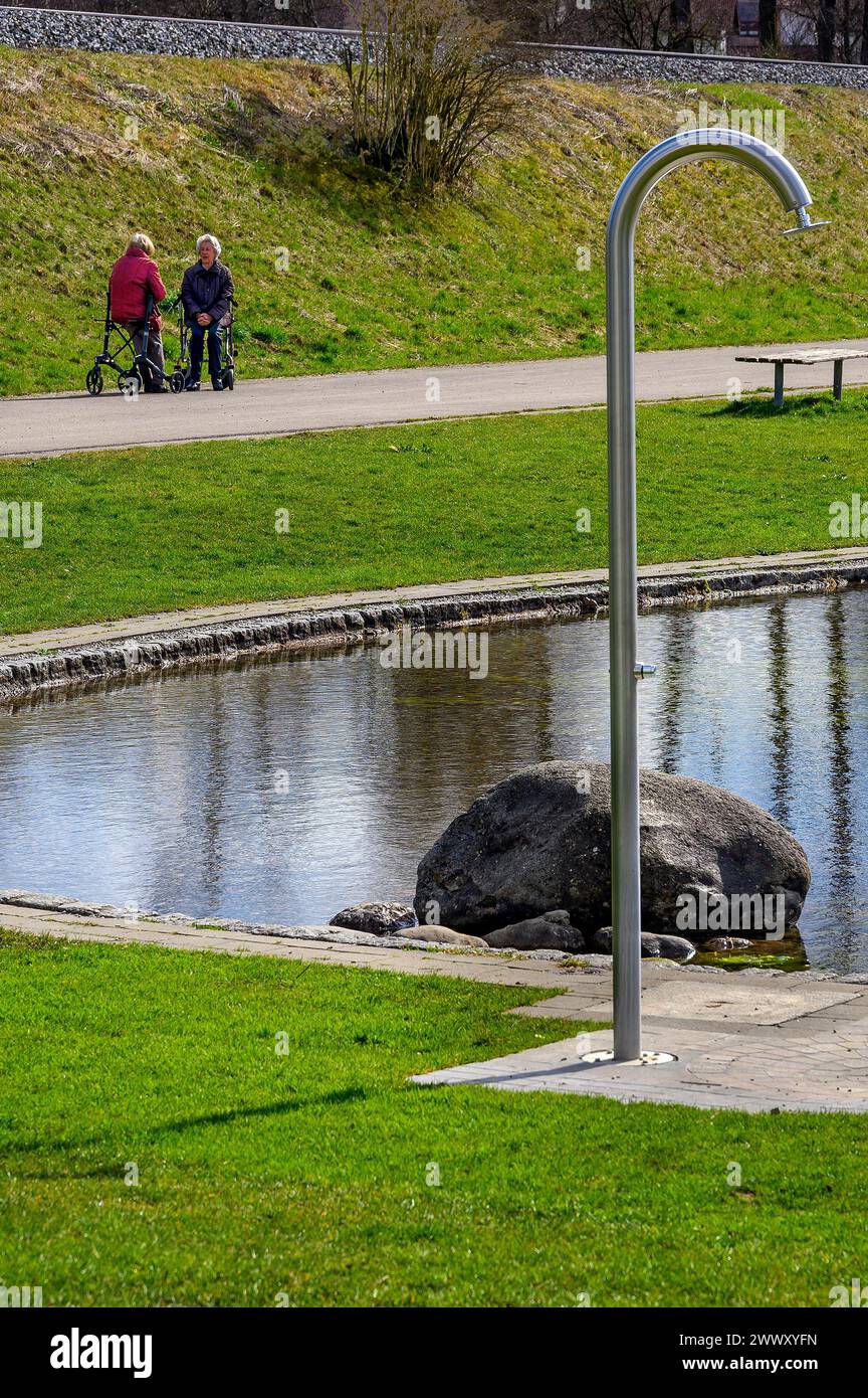Two senior citizens at the pond in WiWaLaMoor, Wildpoldsried, Allgaeu ...