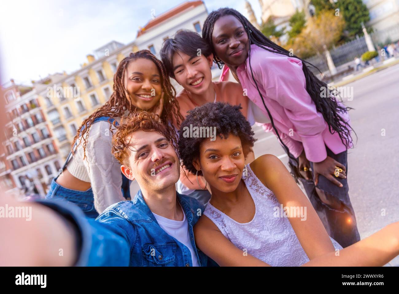Personal perspective of a multi-ethnic group of friends taking a selfie ...