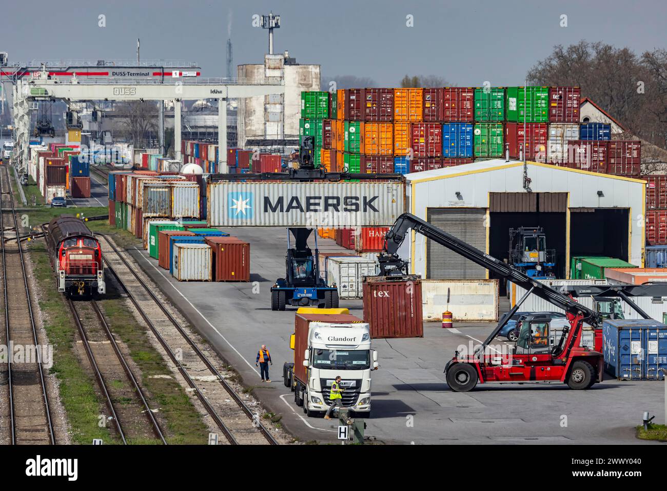 Container terminal in the port of Mannheim, sea containers are stacked ...