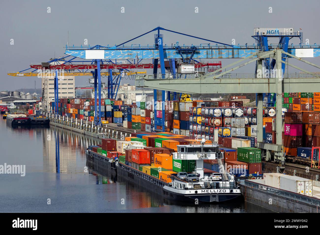Container terminal in the port of Mannheim, sea containers are stacked ...