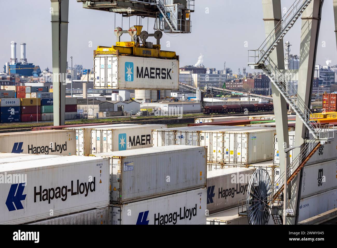 Container terminal in the port of Mannheim, sea containers are stacked ...