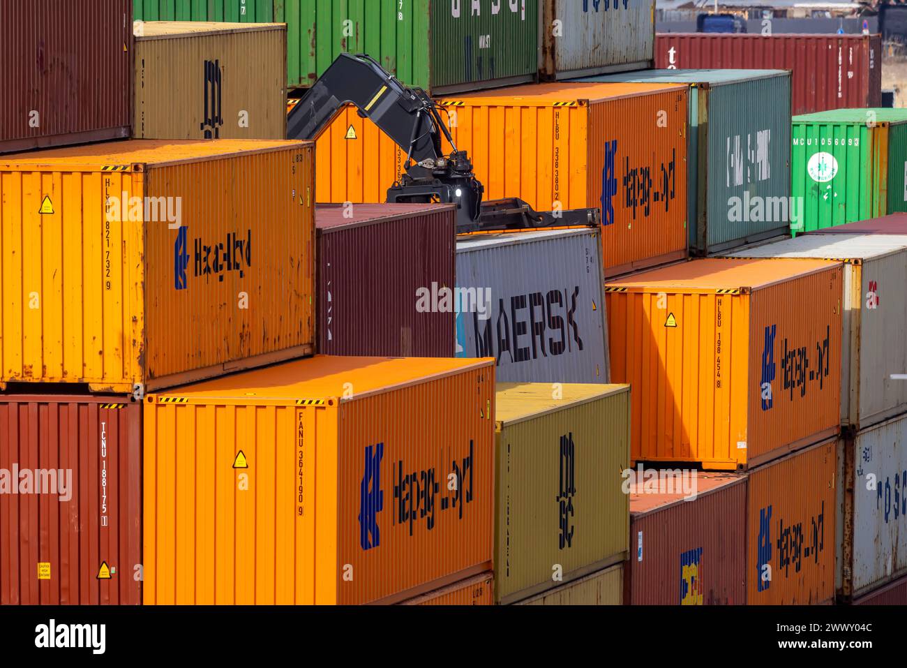 Container terminal in the port of Mannheim, sea containers are stacked ...
