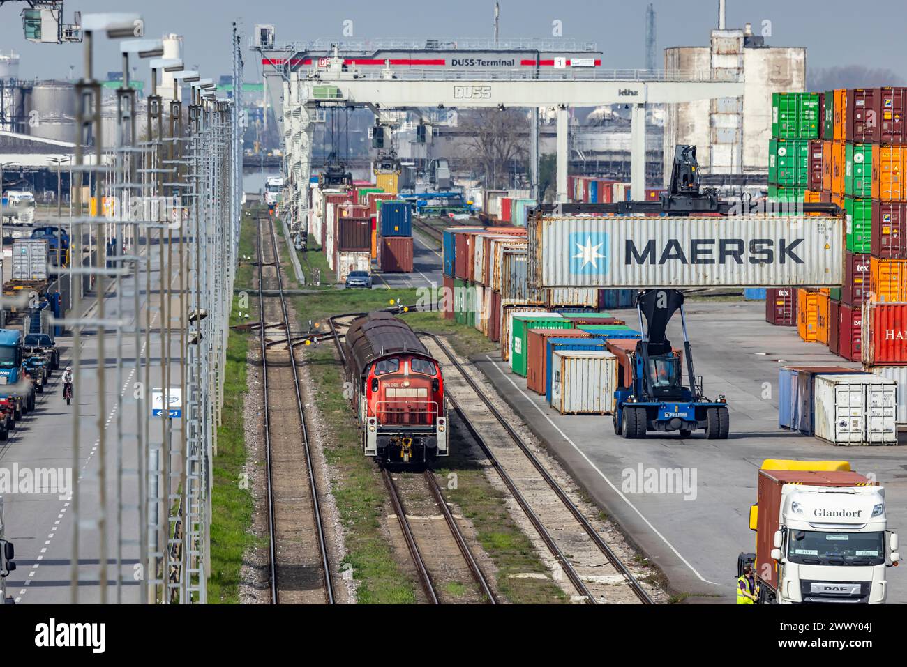 Container terminal in the port of Mannheim, sea containers are stacked ...