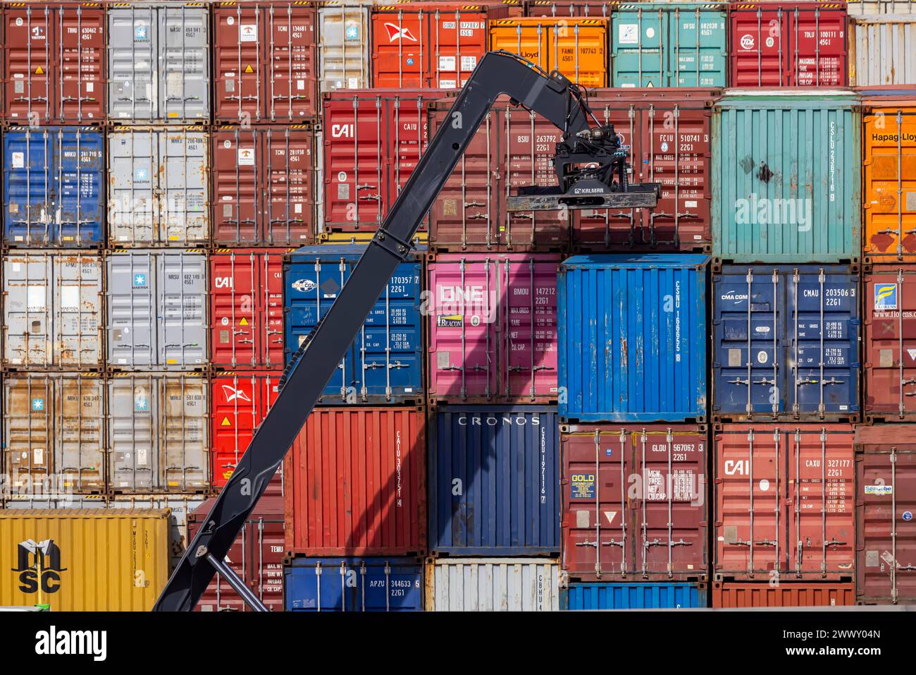 Container terminal in the port of Mannheim, sea containers are stacked ...