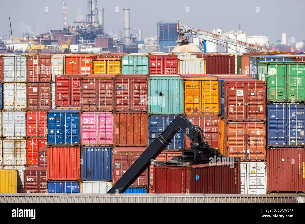 Container terminal in the port of Mannheim, sea containers are stacked ...