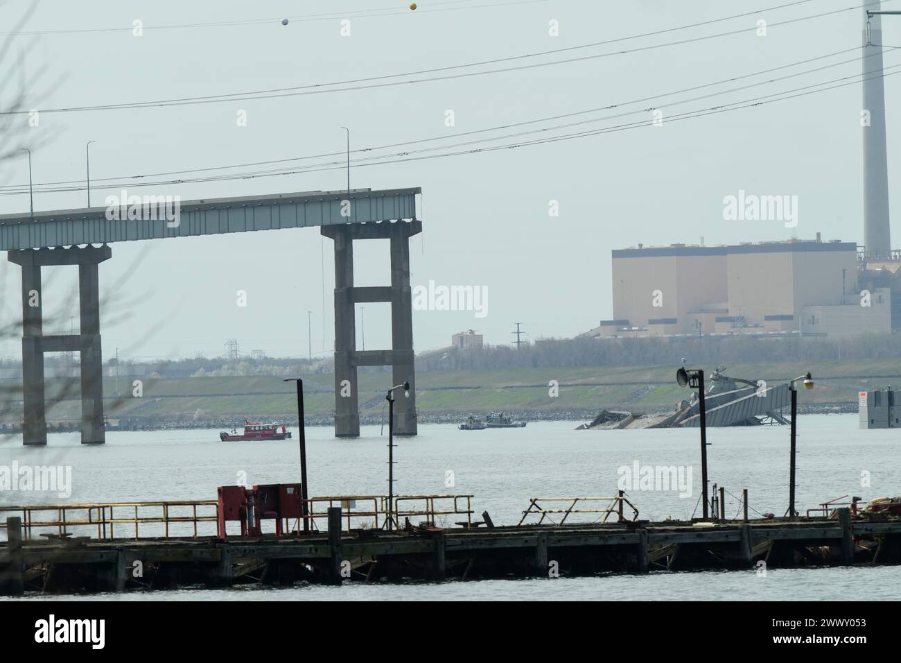 Boats move wreckage of the Francis Scott Key Bridge after it was struck ...
