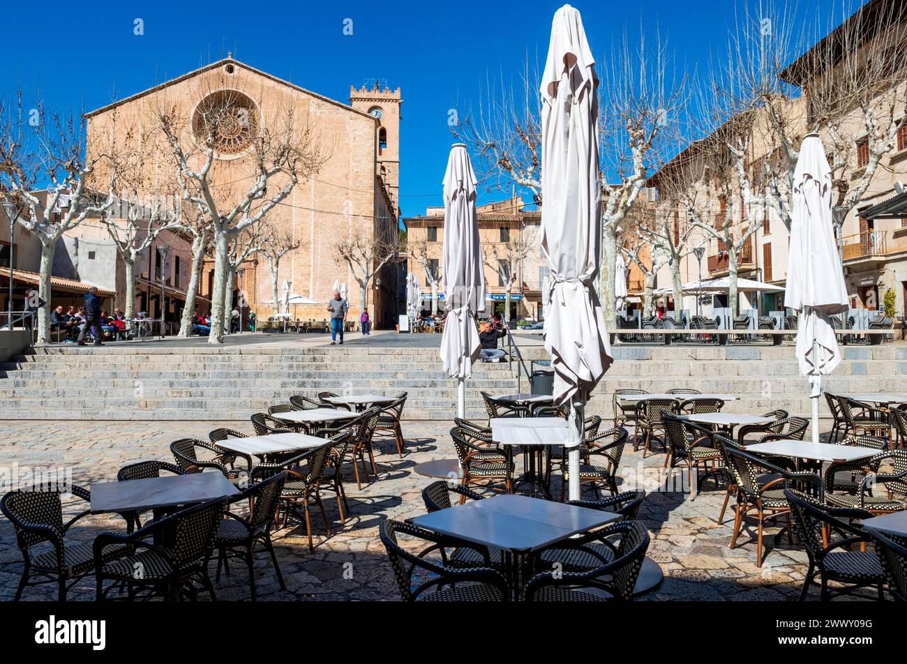 Restaurant terrace at the Plaza Mayor, behind the parish church of ...