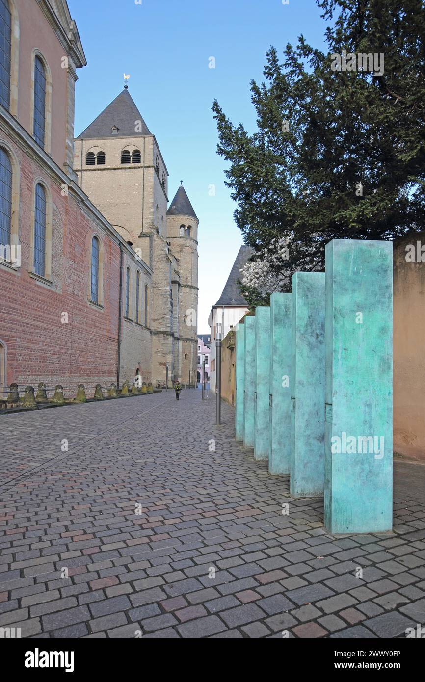 UNESCO St Peter's Cathedral and monument with green stelae on the Platz ...
