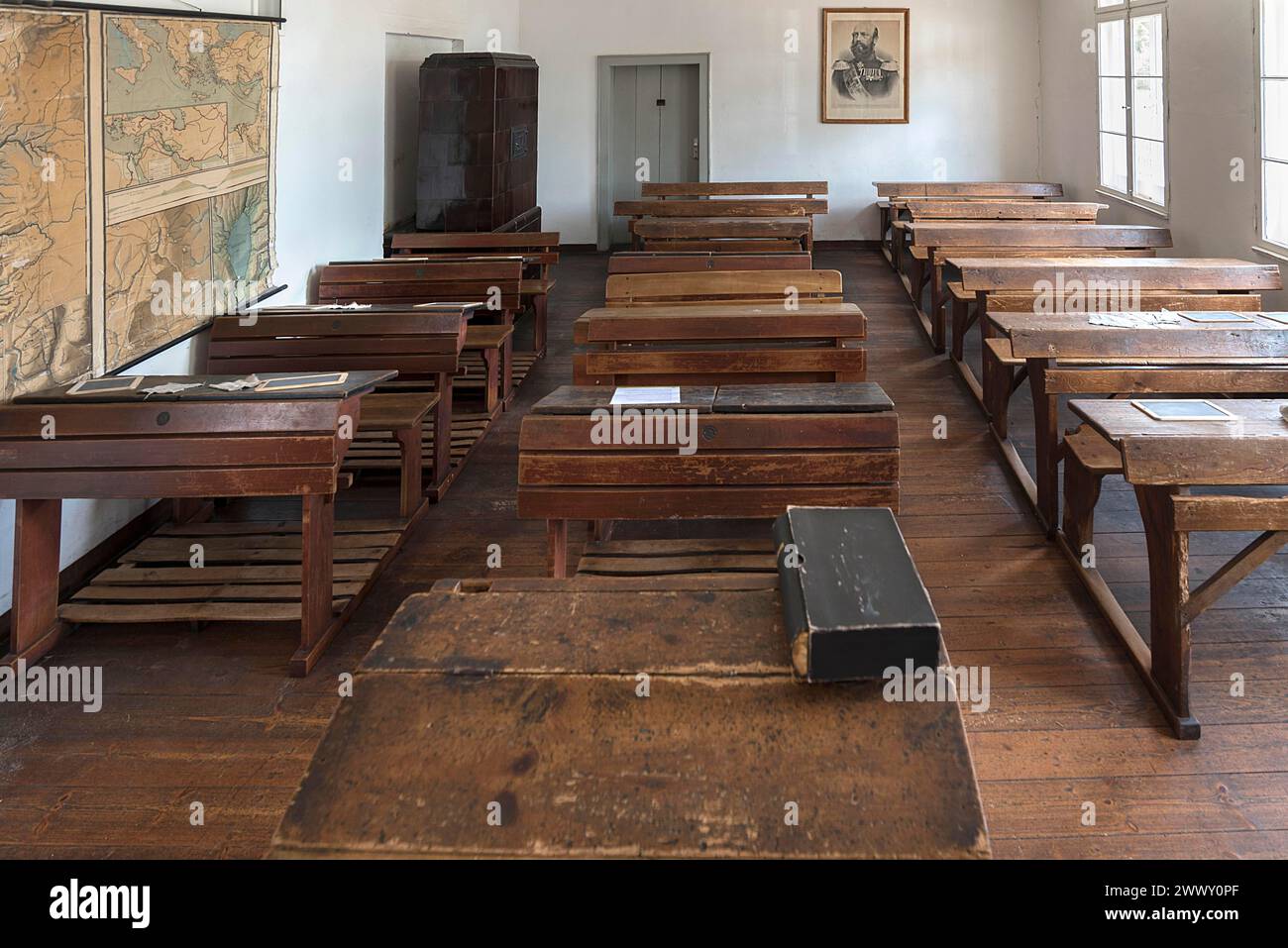 Classroom with school desks and teacher's desk from the 19th century ...