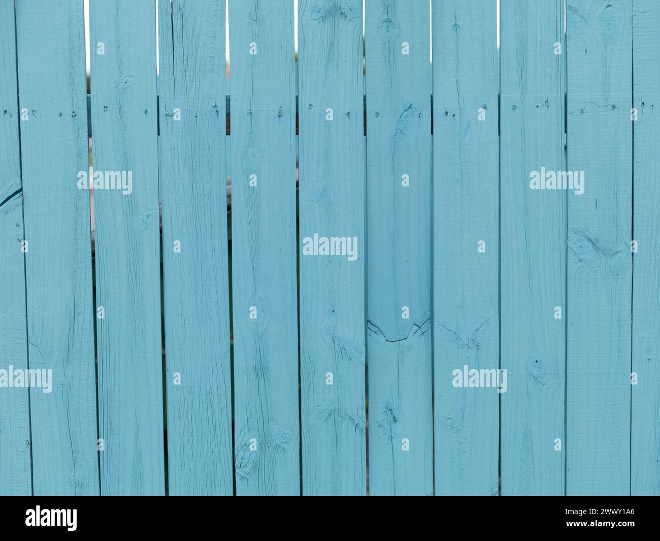 Wooden Fence painted bright blue Stock Photo - Alamy