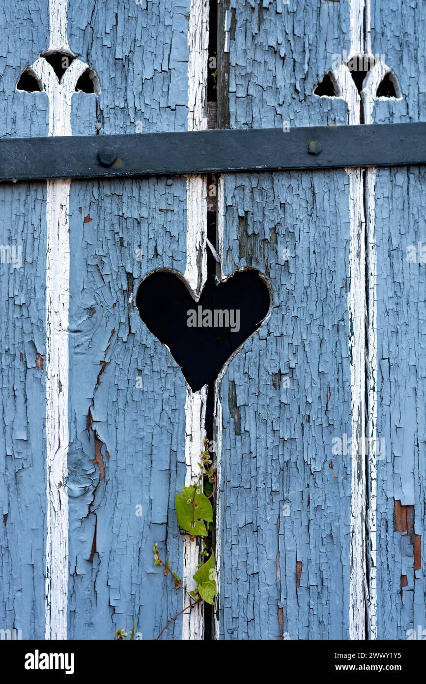 Wooden door with heart, stable door, light-coloured varnish, weathered ...