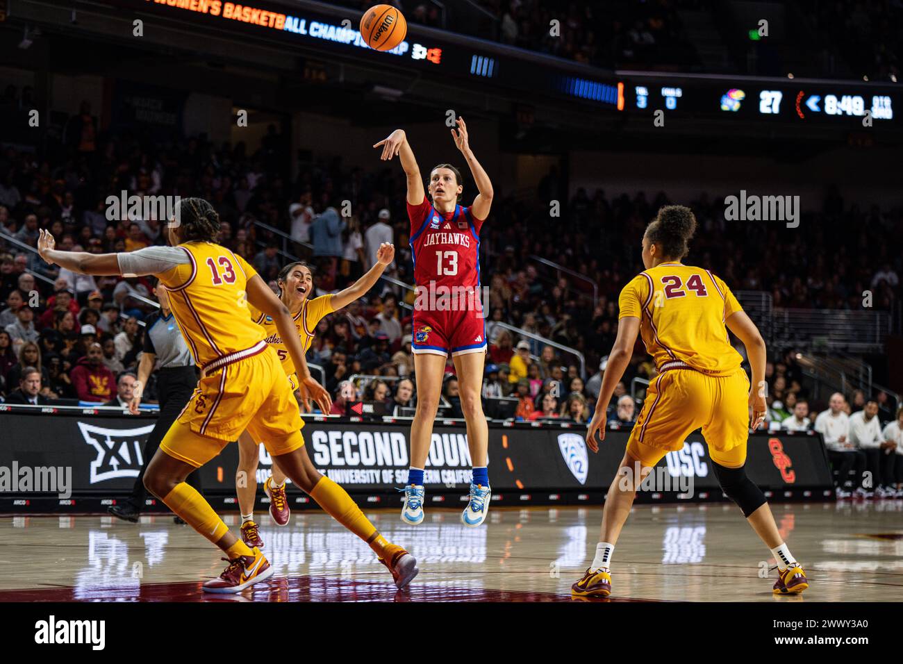 Kansas Jayhawks guard Holly Kersgieter (13) shoots during the second ...