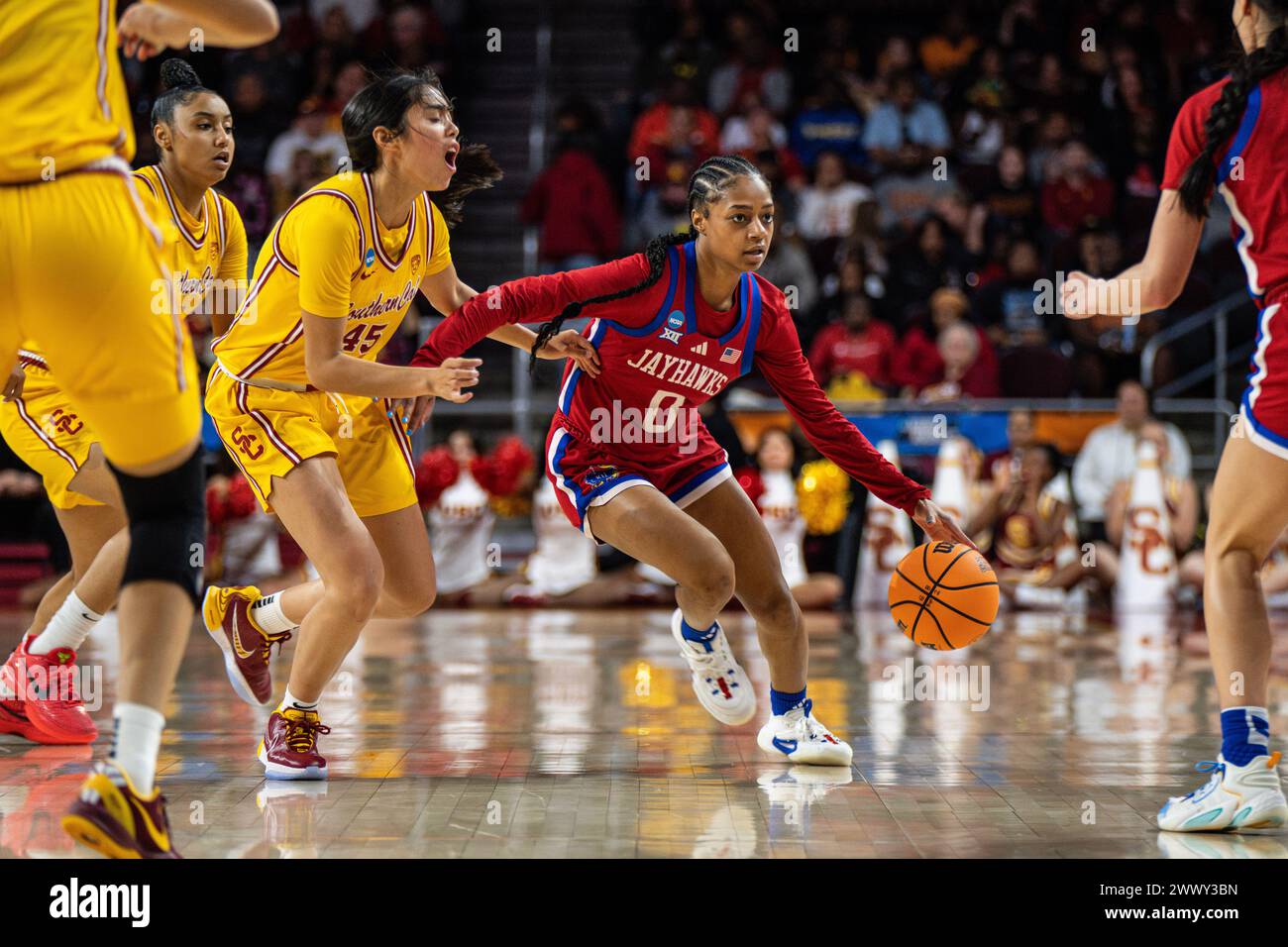 Kansas Jayhawks guard Wyvette Mayberry (0) is defended by USC Trojans ...