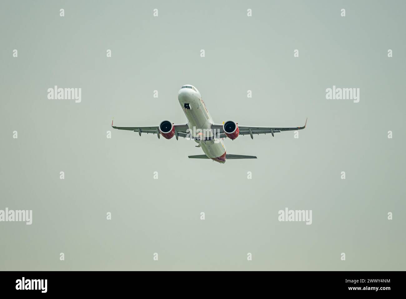 A passenger plane ascending through the skies towards its final ...
