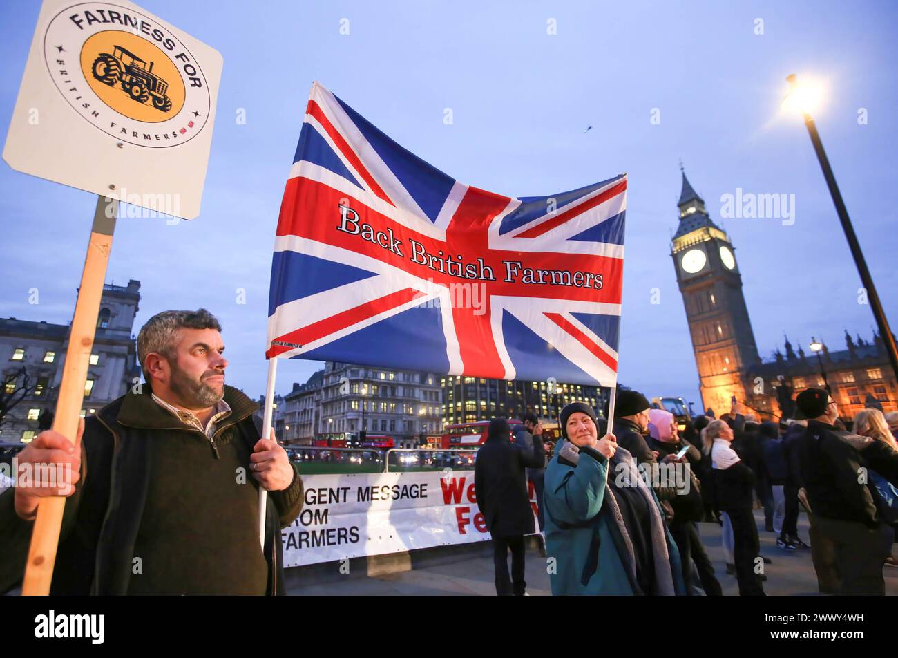 London, UK. 25th Mar, 2024. A supporter holds a placard saying ...